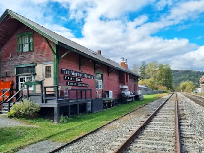 A slice of Vermont history reimagined &ndash; the rustic red exterior of Worthy Burger stands proudly alongside railroad tracks that once brought travelers through Royalton.