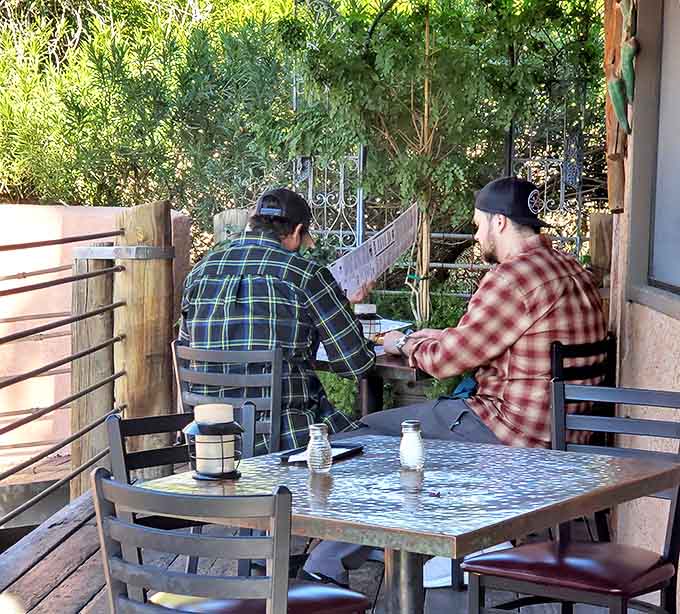 Nothing says quality time like sharing a meal and the newspaper, proving that simple moments make the best memories.