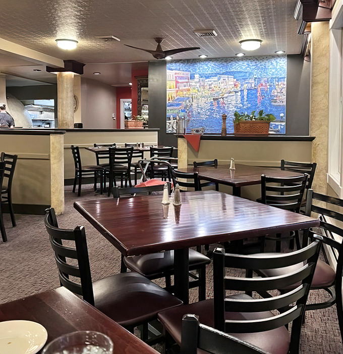 The interior dining space offers a warm embrace with its soft lighting and comfortable seating &ndash; come hungry, leave happy.