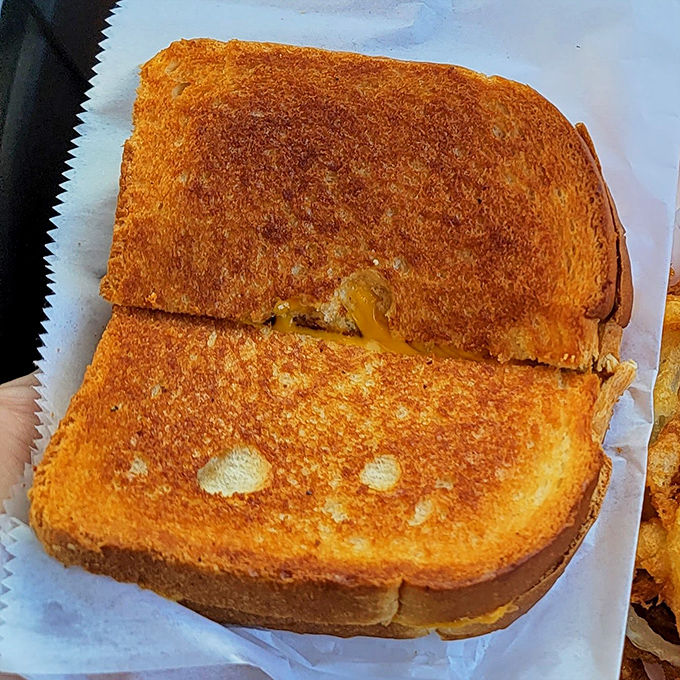 The grilled cheese sandwich &ndash; golden-brown perfection that reminds you why this simple classic has endured for generations.