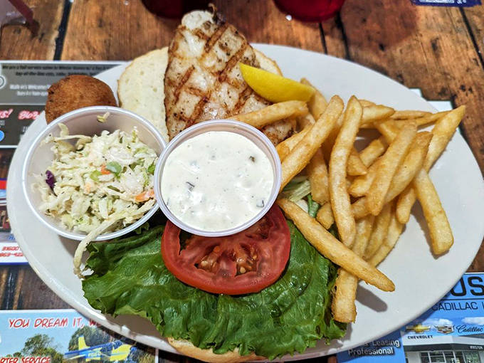 The grouper sandwich – a thick fillet of fresh fish on a substantial bun with all the fixings and crispy fries.