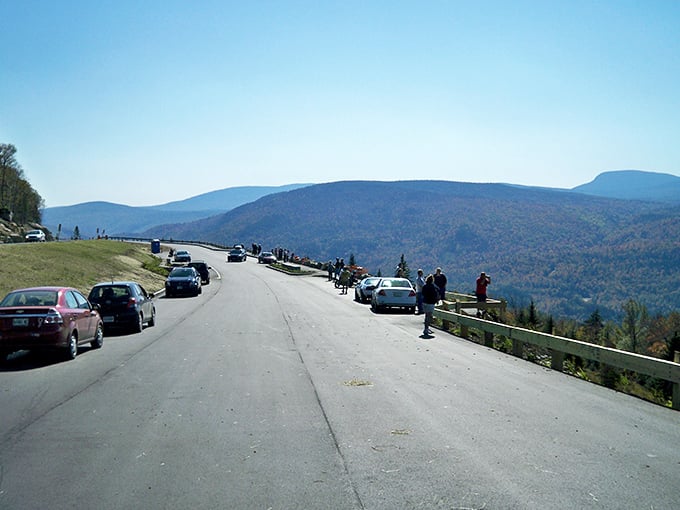 Cars line the Height of Land overlook, where strangers become momentary friends united by collective awe.