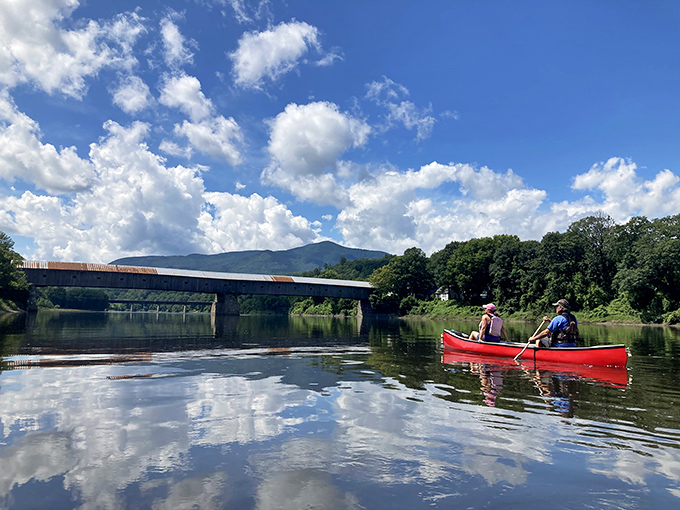 Paddlers gain a unique perspective of the bridge from below, where its massive scale and elegant design become even more apparent.