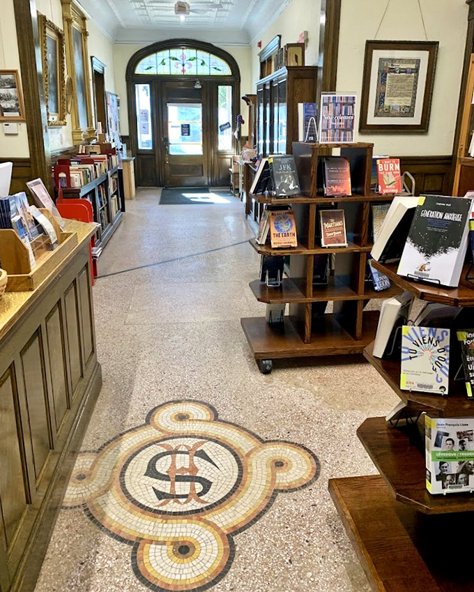 That mosaic floor medallion isn't just decorative&mdash;it's marking literary territory in the most elegant way possible.