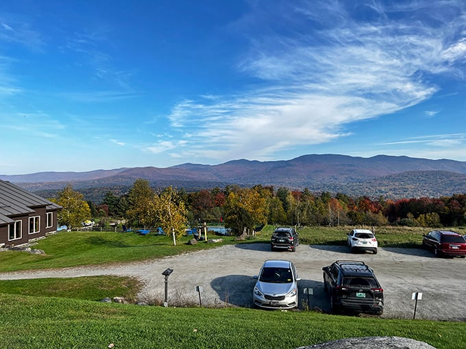 The view stretches forever from the lodge's strategic perch, where Vermont's rolling landscape mimics the Austrian Alps in surprising ways.