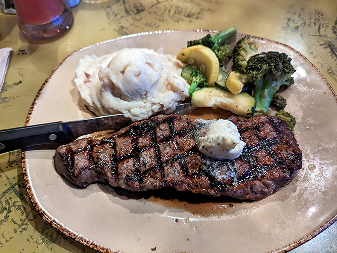 Juicy steaks served with all the fixings prove that prehistoric-themed doesn't mean prehistoric cooking techniques at this surprisingly serious kitchen.