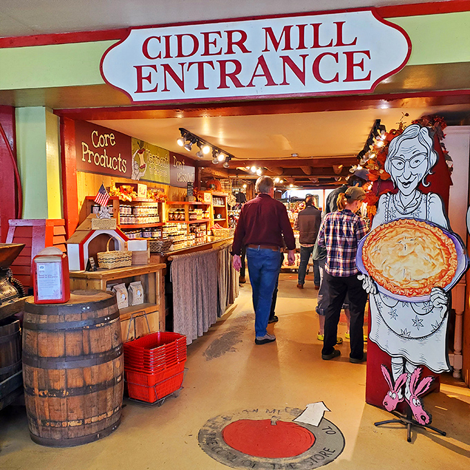 Visitors eagerly enter the cider mill's inner sanctum, where Vermont traditions are preserved and apple-based happiness is dispensed by the cupful.