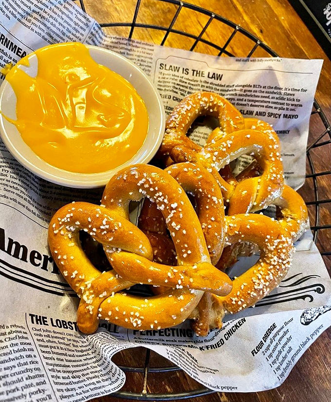 Golden-brown, salt-studded twists of doughy perfection served with molten cheese sauce &ndash; the ultimate beer companion since forever.