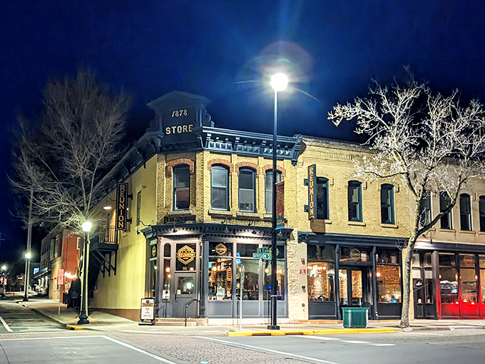 A cozy corner of history glowing at night&mdash;where brick, light, and stories come together.