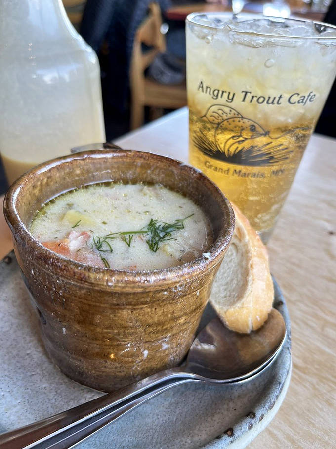 Steam rises from this rustic pottery bowl like morning mist over Lake Superior &ndash; salmon chowder that warms both body and soul.