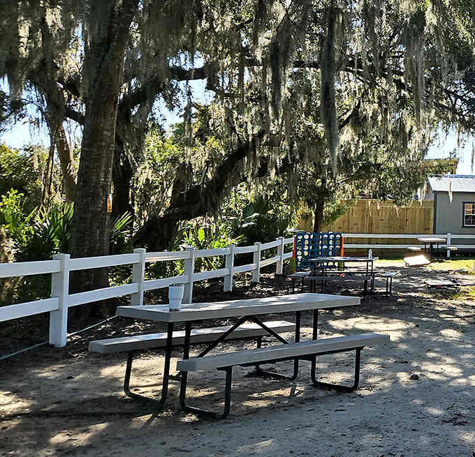 Shaded picnic tables under Spanish moss-draped trees offer the perfect spot to refuel between canyon adventures.