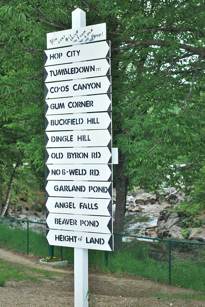 Directional signs point to local landmarks, each name more intriguing than the last. "Tumbledown" and "Hop City" sound like places from a children's storybook.