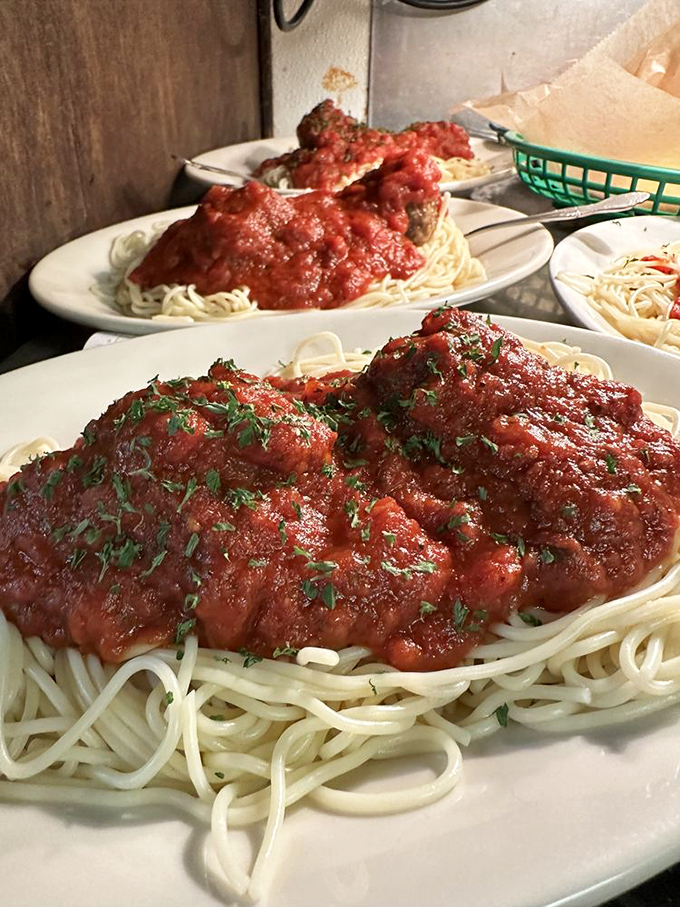 Spaghetti and meatballs that would make any nonna proud – comfort food elevated through decades of perfection.