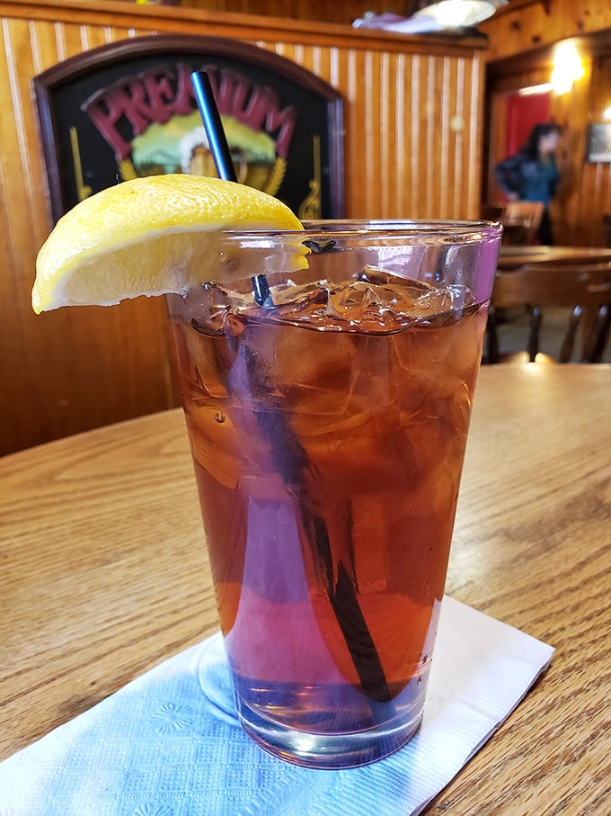 A perfectly brewed iced tea with lemon, because sometimes the simplest pleasures are the most satisfying companions to a magnificent meal.