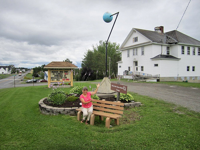 A visitor takes a moment to appreciate Uranus, demonstrating that sometimes the best vacation photos happen 19 miles from the Sun.