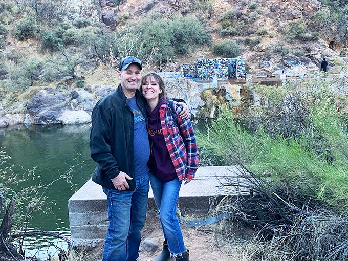 Visitors find their own slice of paradise along the riverbank, where desert meets water in perfect harmony.