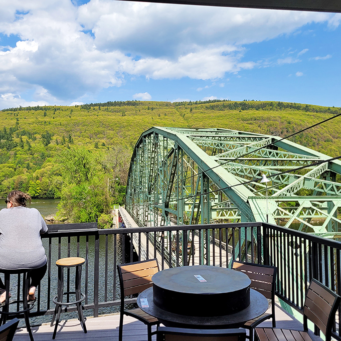 Riverside dining with bridge views turns ordinary meals into experiences, especially when craft beer and seasonal menus meet the soothing soundtrack of flowing water and good conversation.