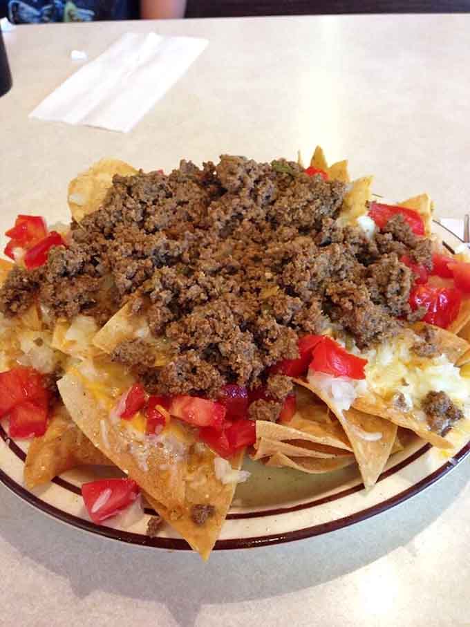 These nachos don't mess around, loaded with enough toppings to require strategic planning and extra napkins.