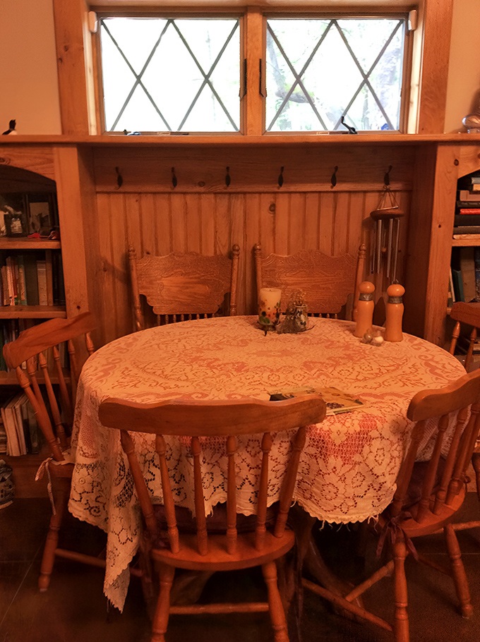 The dining area combines rustic charm with homey touches, perfect for enjoying all seven hobbit meals of the day.