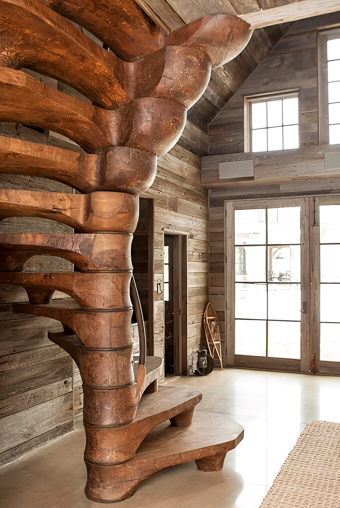 Nature becomes art in this extraordinary spiral staircase, each wooden curve flowing organically into the next.
