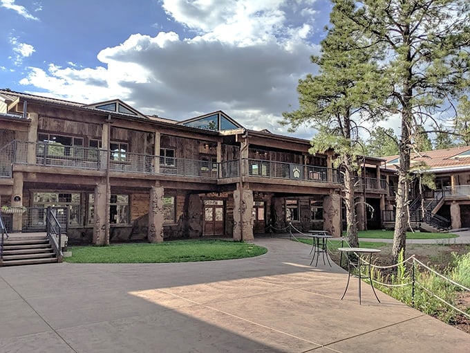 The Fort Bearizona courtyard offers a moment of respite between wildlife encounters, with rustic architecture that complements the natural setting.
