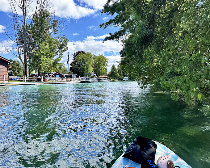 Boating on Torch Lake isn't transportation, it's transformation. Every ripple reveals another shade of impossible blue.
