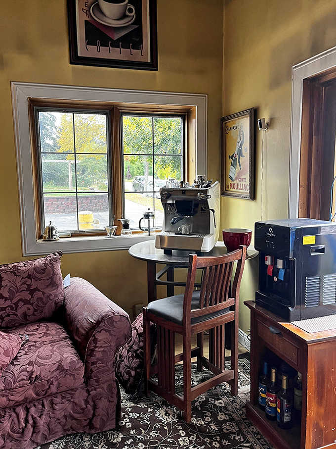 The cozy coffee nook where caffeine dreams come true, complete with vintage art that says, "Yes, this place understands comfort."