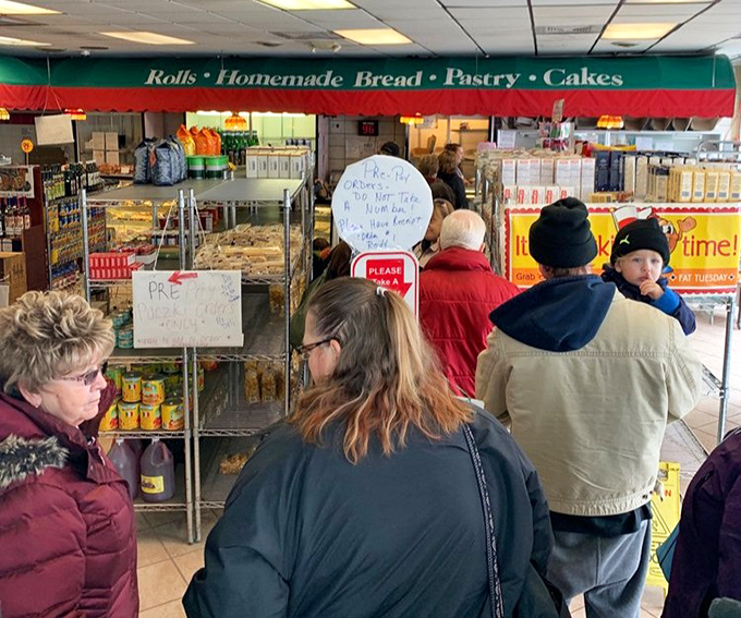 The line forms early at Tringali's – where patience is rewarded with pastry perfection and strangers become friends over shared sweet anticipation.