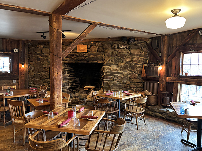 Stone hearth warmth creates the perfect backdrop for intimate conversations and memorable meals.