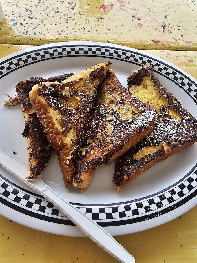 Crisp edges, custardy centers, and a dusting of powdered sugar &ndash; breakfast as it was meant to be before Instagram existed.