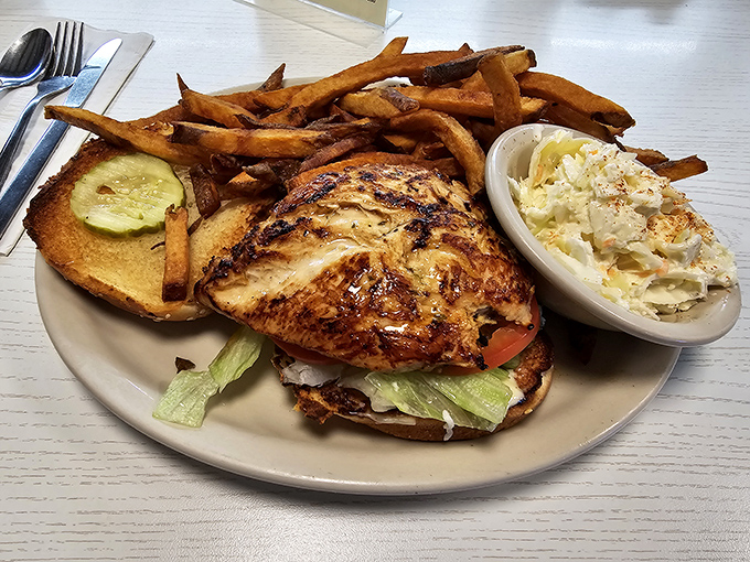 A grilled chicken sandwich that's juicy, flavorful, and served with fries so crispy they could probably be heard crunching from the parking lot outside.