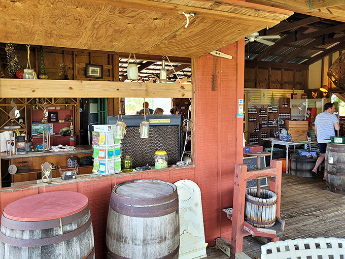Another angle reveals more rustic charm, with wine barrels repurposed as tables and an atmosphere that encourages lingering conversations.