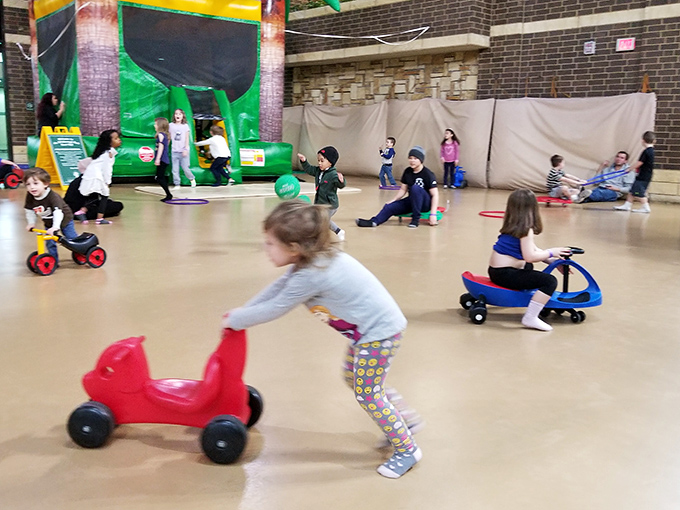 Tiny athletes master the art of ride-on vehicle operation, preparing for their future careers as very short race car drivers.