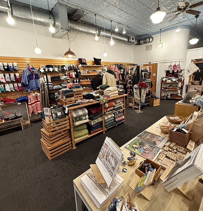 Handcrafted woolens in traditional patterns create a tactile rainbow, each piece warmer and more inviting than the last.