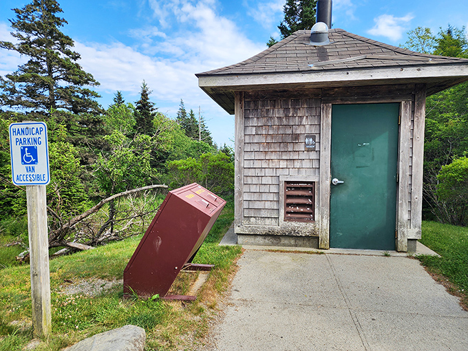 The humble trailhead facility &ndash; less glamorous than what's ahead but essential for comfort during your wilderness adventure.