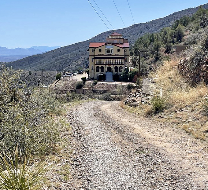 This rugged pathway leading to the hotel seems to invite adventure-seekers, ghost-hunters, and the merely curious to discover what waits at journey's end.