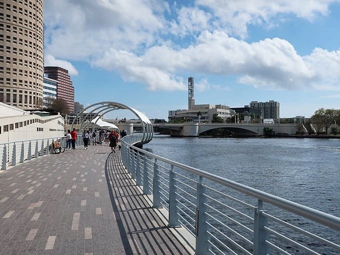 The wide, accessible pathways of the Riverwalk welcome everyone from joggers to families, with plenty of room to enjoy the riverfront views.