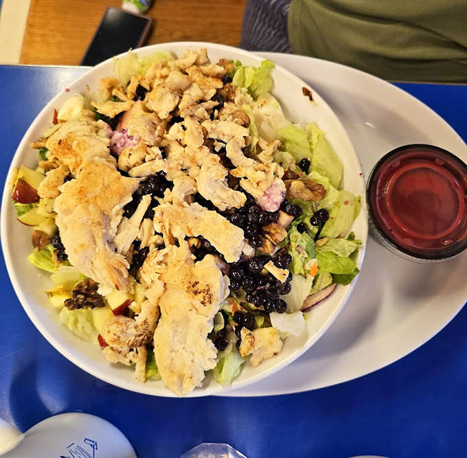 Not just an afterthought, their salads feature fresh ingredients that provide a crisp counterpoint to the rich, cheesy main event.