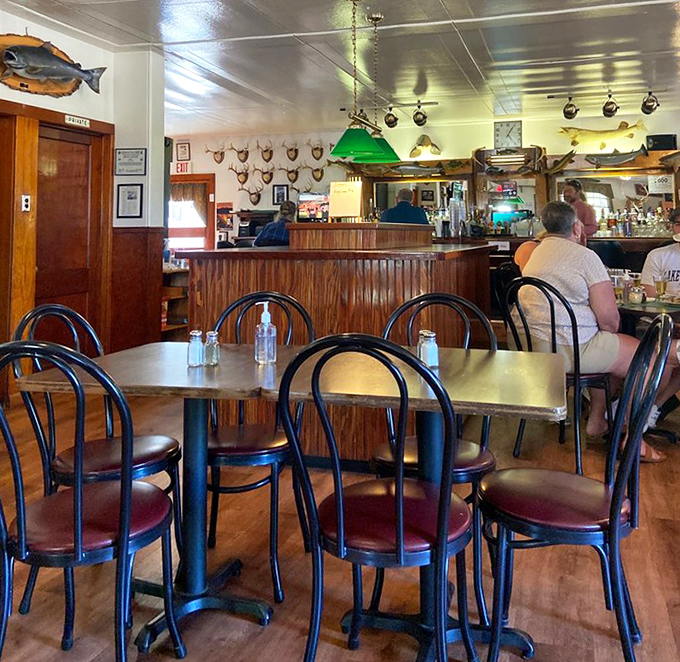 Old-school charm meets comfort food: The nearby eatery's wood-paneled interior and mounted fish tell stories of Leelanau's rich history.