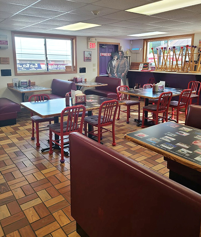 The dining area waits quietly between rushes, like a theater before the show. Those tables have witnessed countless "mmms" and "wows."