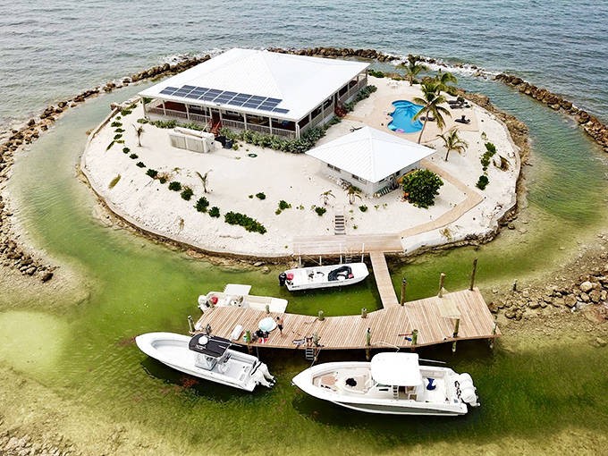 The ultimate bird's-eye view reveals East Sister Rock Island's perfect symmetry—a bullseye of paradise in Florida's azure playground.