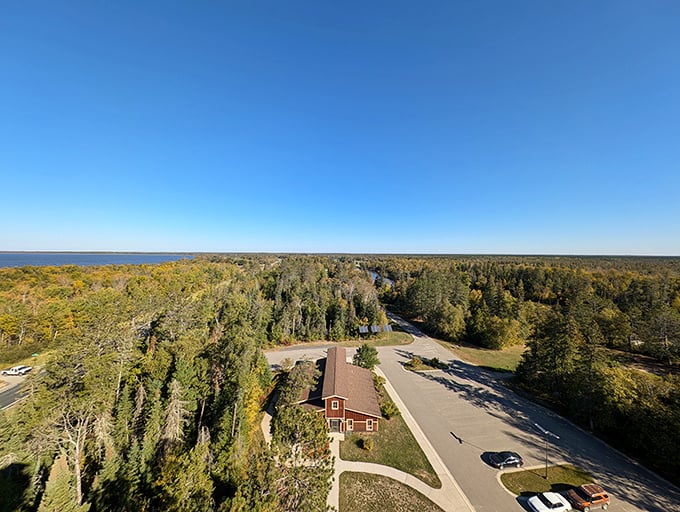 From the fire tower's summit, the landscape unfolds like a living map, revealing the true scale of this natural wonder.