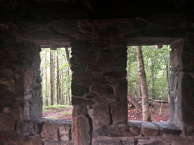 Stone-framed windows turn the surrounding woods into natural artwork, better than anything you'd find in a gallery and infinitely more affordable.