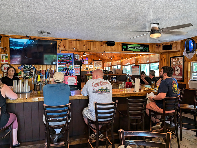 Pine-paneled walls and multiple screens create the perfect sports-watching environment &ndash; bartenders ready to pour local brews and share burger wisdom.