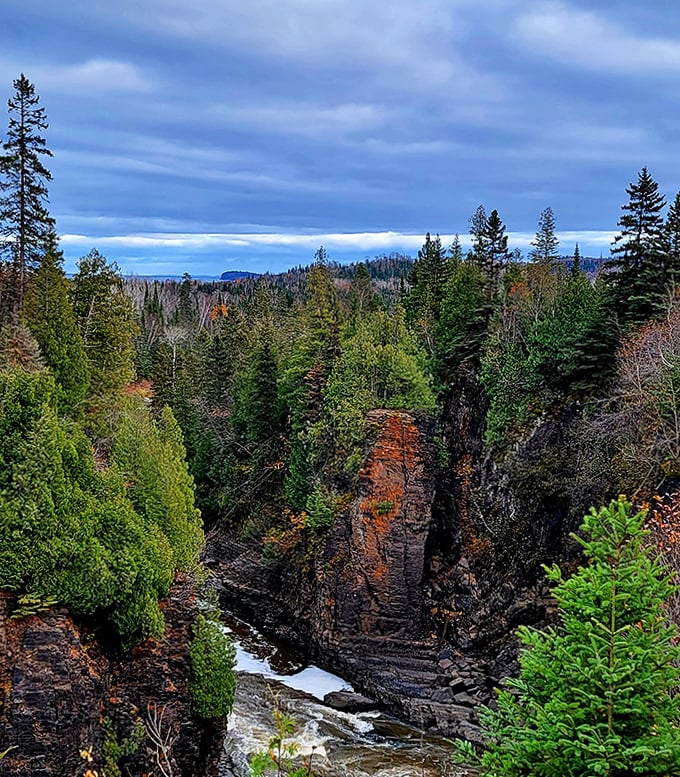 The river continues its journey through this dramatic gorge, a reminder that persistence can carve paths through the hardest obstacles.