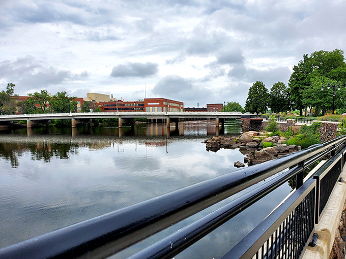 The bridge spans more than just water &ndash; it connects neighborhoods, histories, and generations in this river-centered community.
