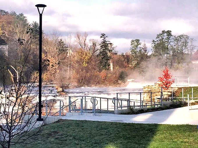 Comtu Cascade Park offers misty morning magic, where nature's power show runs continuously, admission always free.