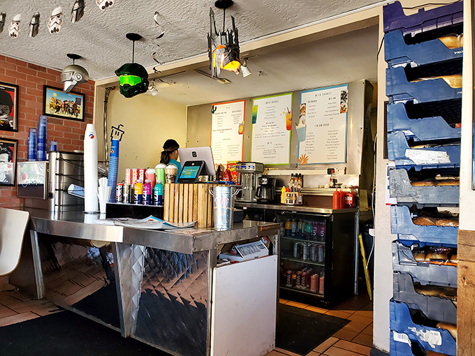 The command center of flavor creation, where friendly staff transform orders into edible art with surprising efficiency.