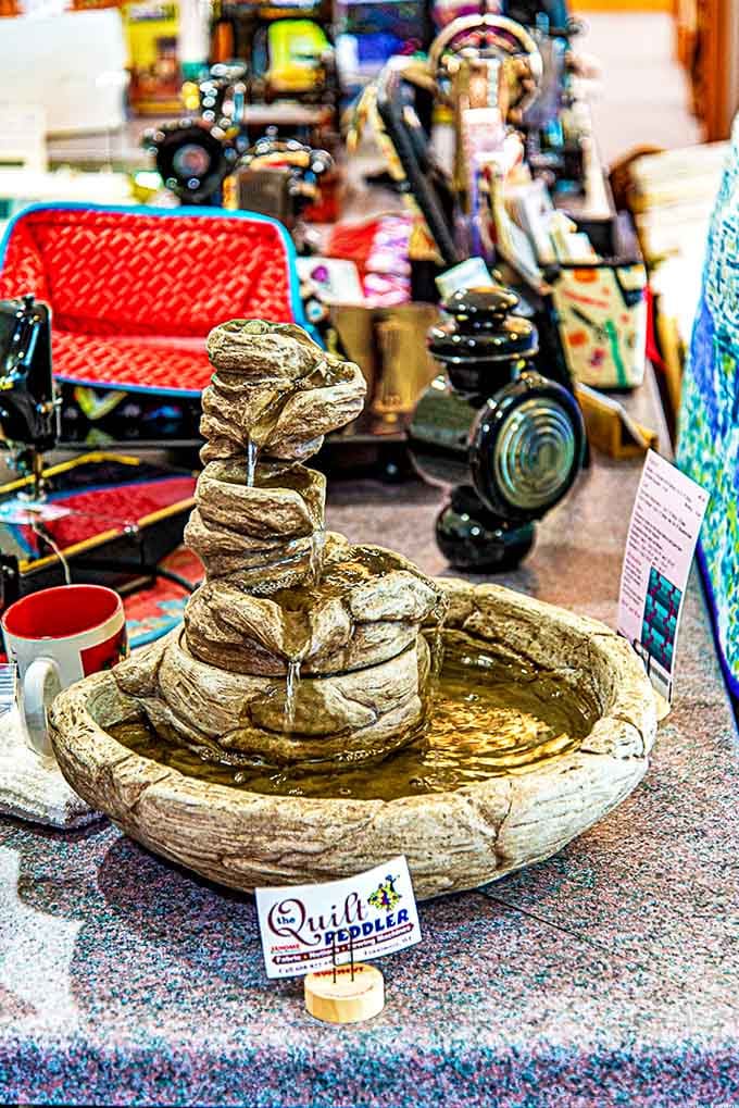 A peaceful fountain adds unexpected tranquility to the shopping experience &ndash; the gentle soundtrack to creative contemplation.