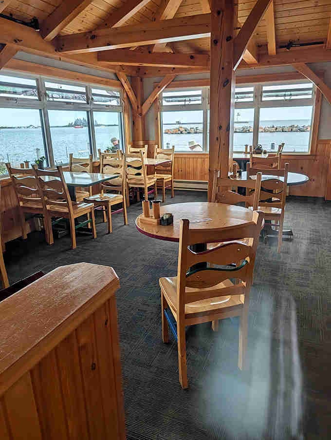 Where timber meets water views &ndash; the dining room frames Lake Superior's ever-changing canvas through windows that serve as living artwork.